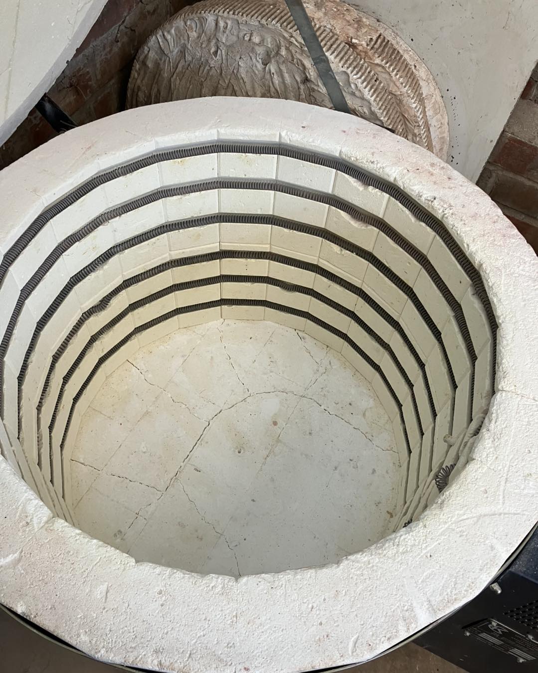 Two top-loading Cromartie kilns and a Leach pottery kick-wheel ...